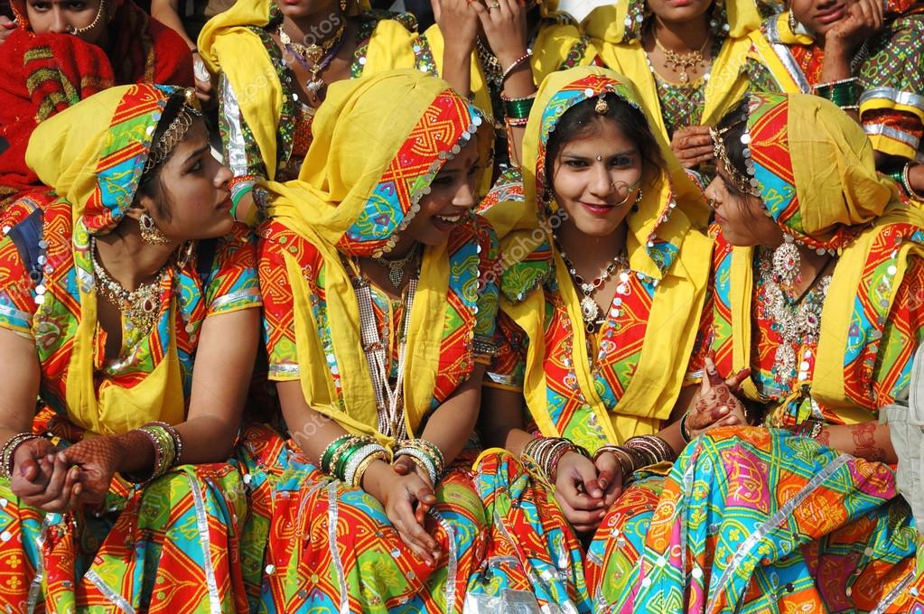 Beautiful Indian Women In Traditional Rajasthani Clothes Preparing To