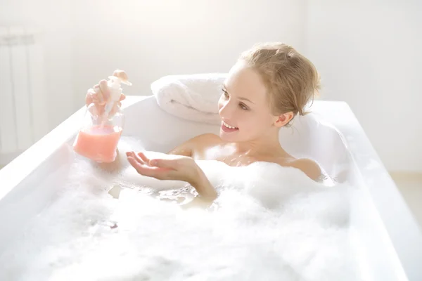 Girl relaxing in bathtub — Stock Photo © AnmFoto #20132567