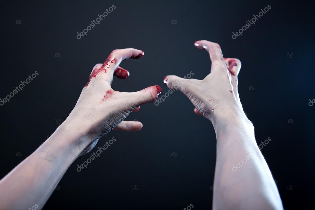 Grey skin bloody zombie hands — Stock Photo © Elisanth #27819861