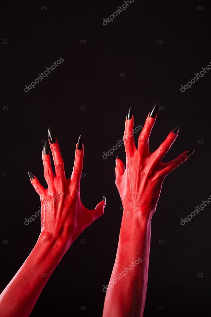 Red devil hands with sharp black nails, real body-art — Stock Photo ...