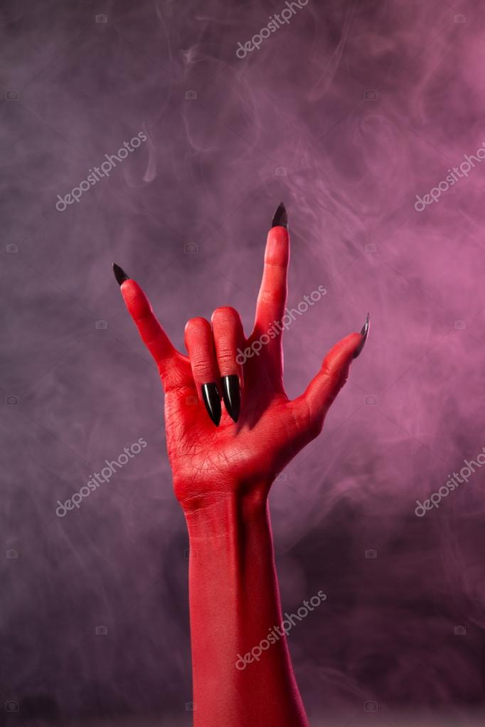 Heavy metal, red devil hand with black nails Stock Photo by ©Elisanth ...