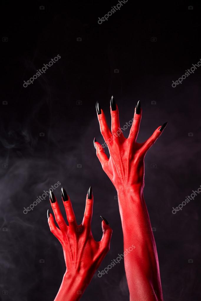 Horror red devil hands with black nails Stock Photo by ©Elisanth 44799971