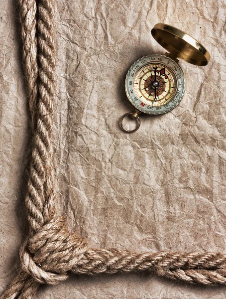 Compass, old paper and rope — Stock Photo © Observer #5481231