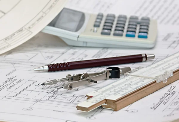 Technical drawings and slide rule — Stock Photo © Observer #2706985