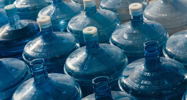 Images: big empty bottle | Big empty water bottles in a row — Stock ...