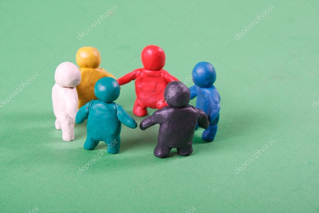 Human figures from clay stand in a circle — Stock Photo © puhfoto #18043209