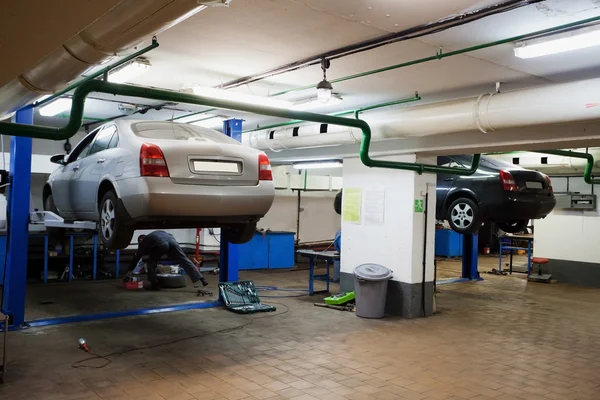 Car under repair Stock Photo by ©uatp12 1665844