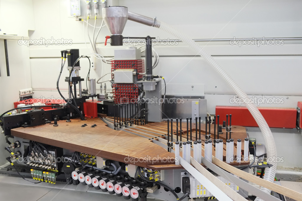 Machine for sticking on adhesive tape Stock Photo by ©uatp12 36466487