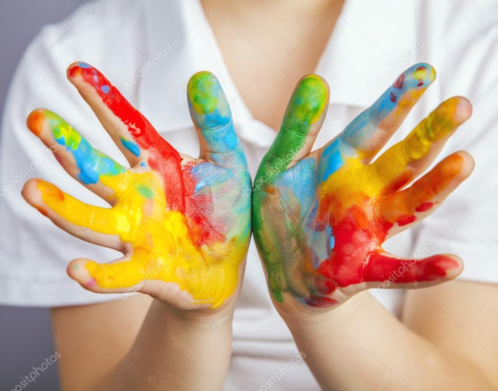 Hands painted in colorful paints Stock Photo by ©anelina 43421889