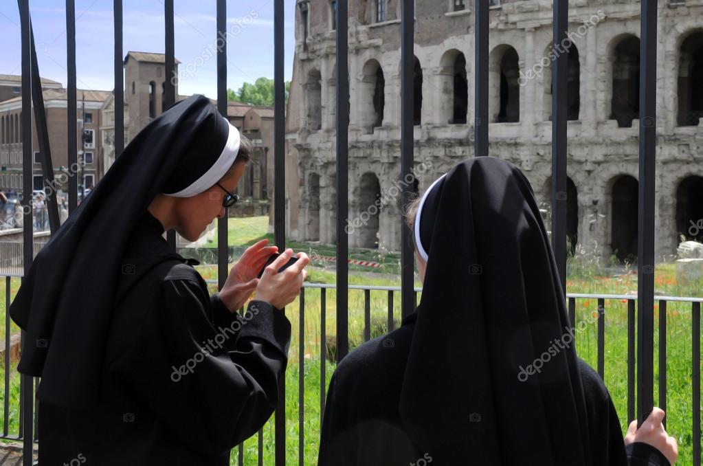 Two Nuns in Rome — Stock Editorial Photo © vicspacewalker #48010771