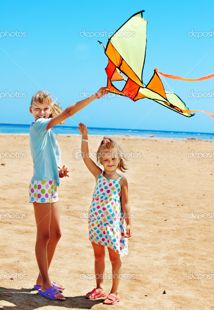 Kid flying kite outdoor. — Stock Photo © poznyakov #23311522