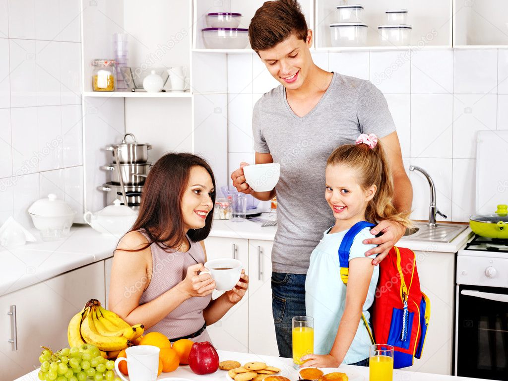 Parents prepare child for school — Stock Photo © poznyakov #30744087 Parents prepare child for school — Stock Photo © poznyakov #30744087
