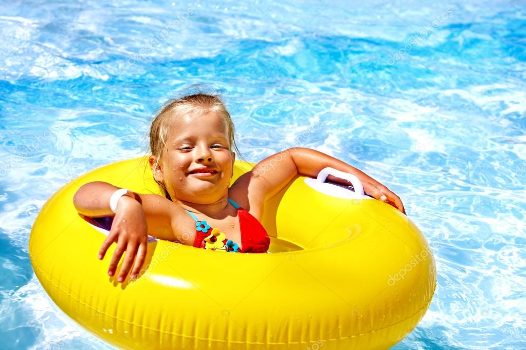 Children sitting on inflatable ring Stock Photo by ©poznyakov 40154029