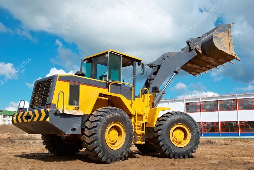 Wheel loader excavator at work — Stock Photo © kalinovsky #18561815