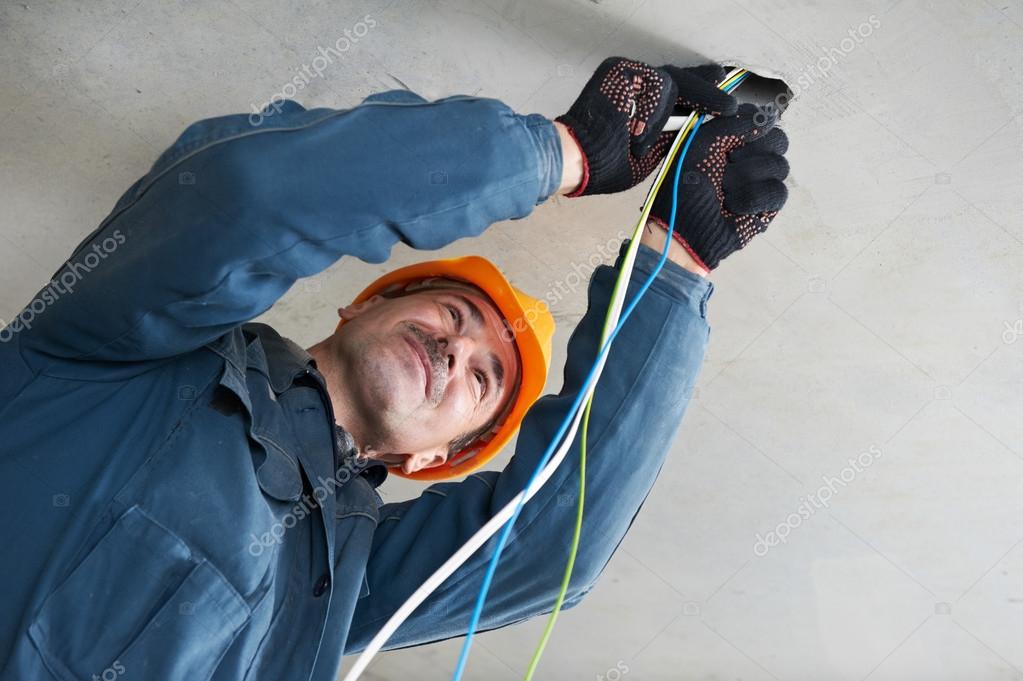 Electrician at wiring work — Stock Photo © kalinovsky #21440529