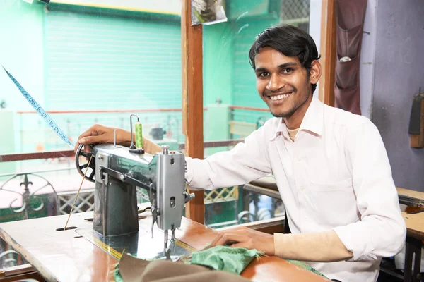Young indian tailor man Stock Photos, Royalty Free Young indian tailor ...