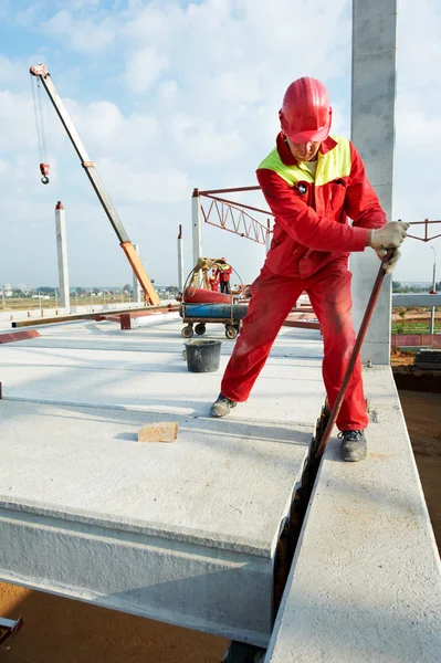Builder worker installing concrete slab — Stock Photo © kalinovsky ...