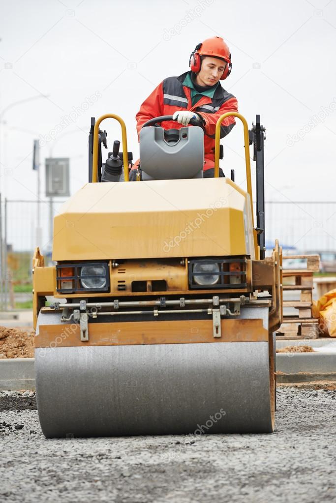 Compactor roller at road work Stock Photo by ©kalinovsky 35845961