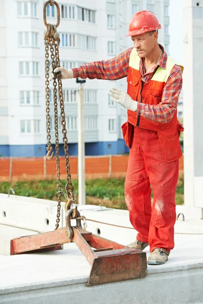 Builder worker installing concrete slab — Stock Photo © kalinovsky ...