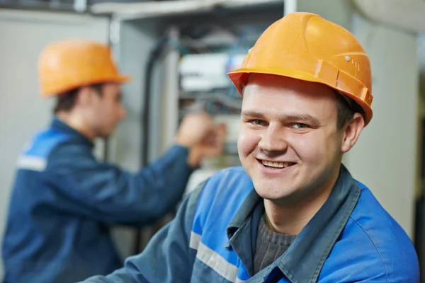 Two electrician workers — Stock Photo © kalinovsky #42220331
