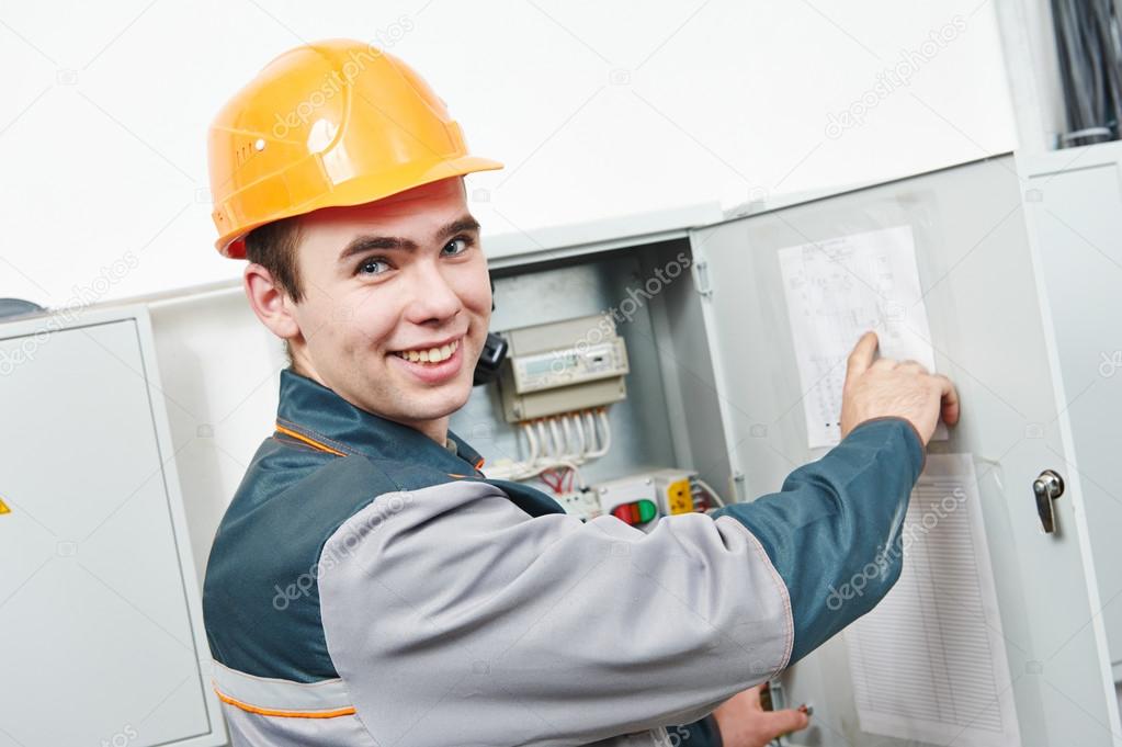 Happy electrician engineer worker Stock Photo by ©kalinovsky 42220311