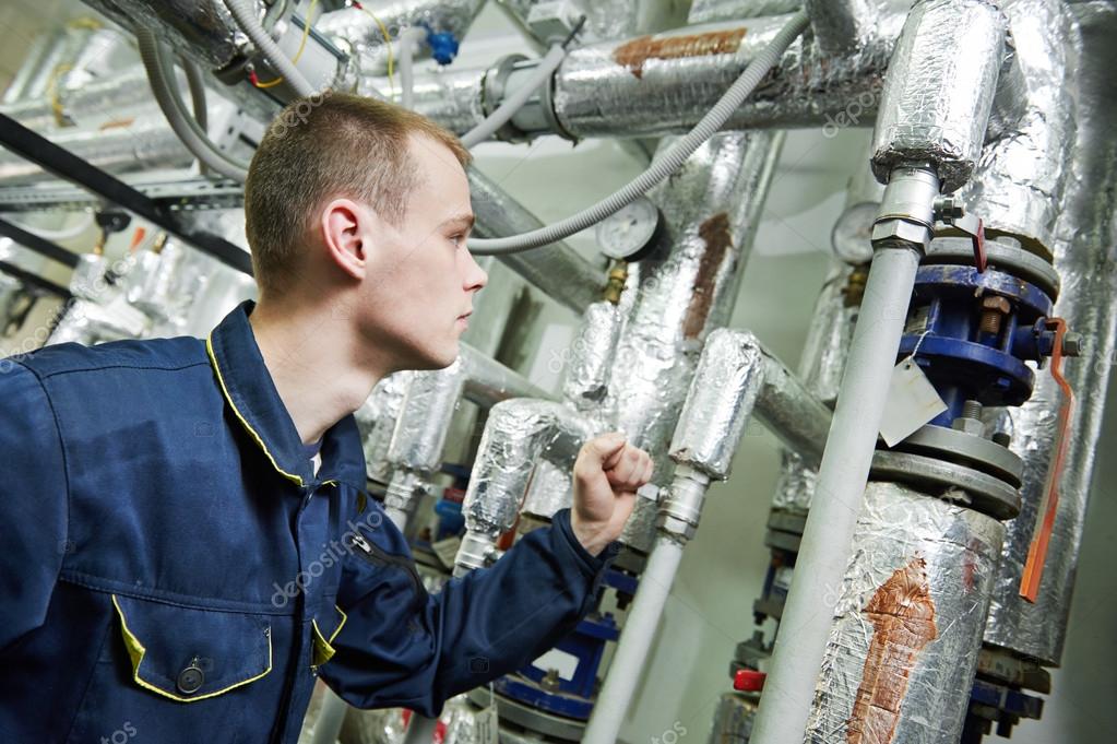 Heating engineer repairman in boiler room Stock Photo by ©kalinovsky ...