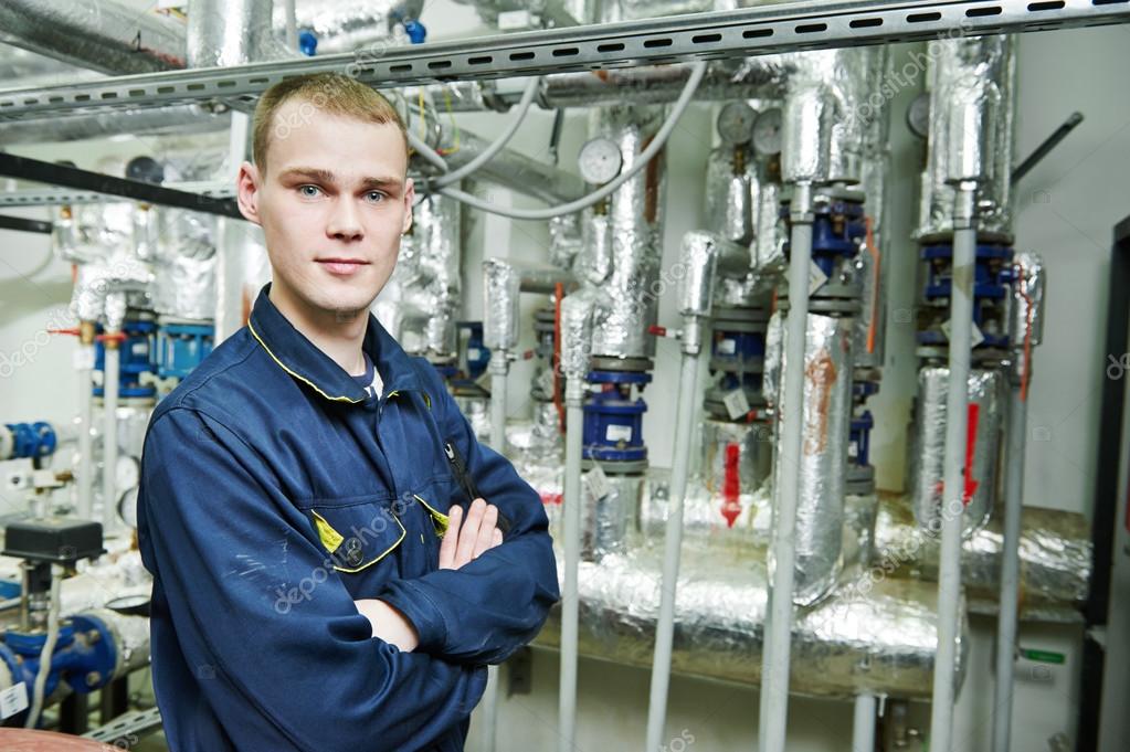Heating engineer repairman in boiler room — Stock Photo © kalinovsky ...