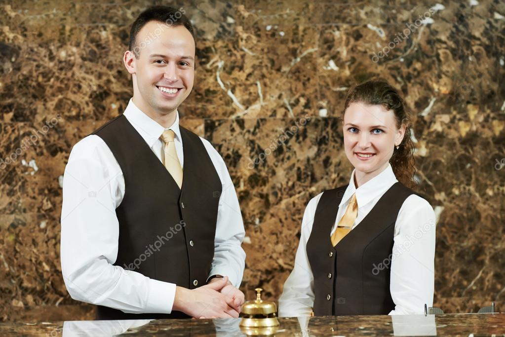 Hotel worker on reception Stock Photo by ©kalinovsky 46000159