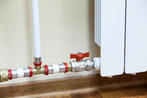 Pipelines of central heating radiator — Stock Photo © antiksu #37338129