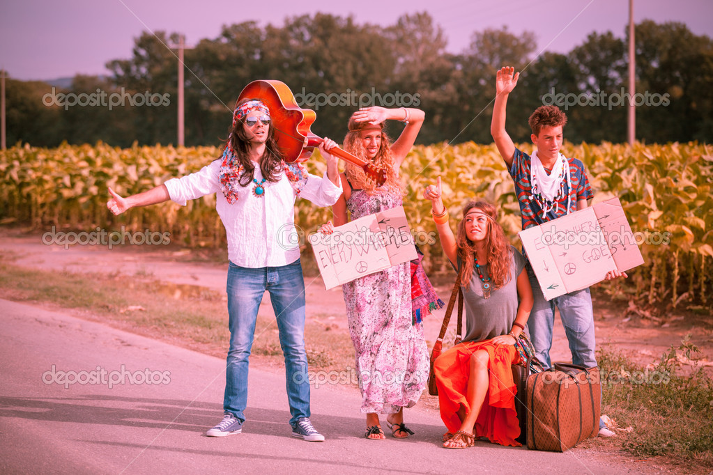 Hippie Group Hitchhiking on a Countryside Road — Stock Photo ...