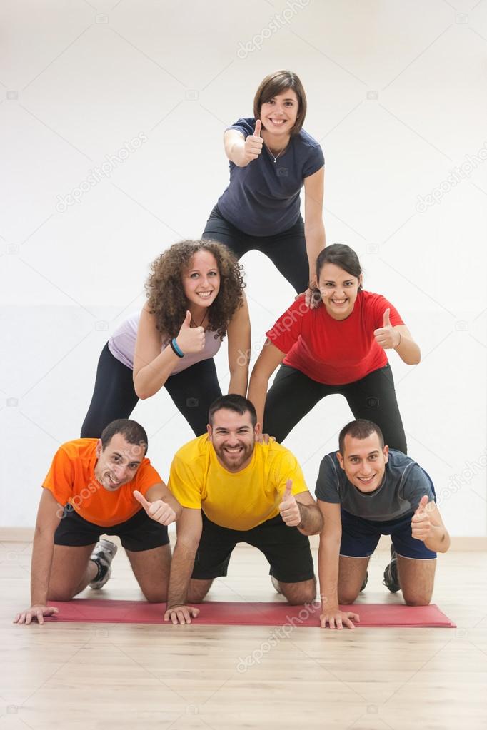 Human Pyramid and Thumbs Up — Stock Photo © william87 #16778363
