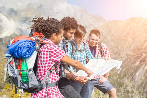 Hikers Looking at Map on top of Mountain Stock Photo by ©william87 45028653