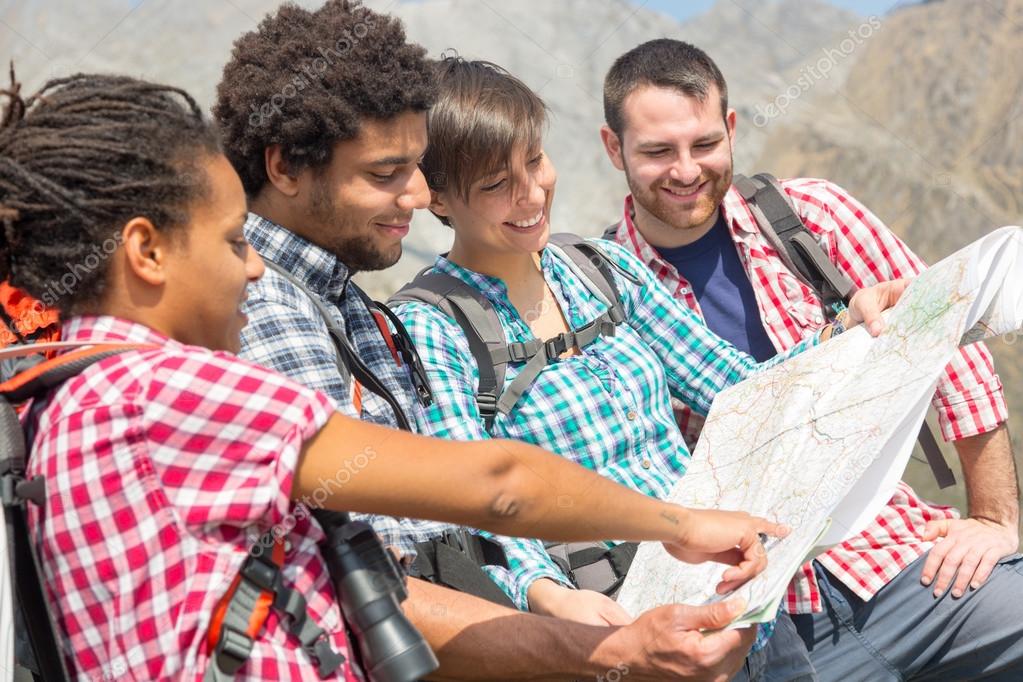 Hikers Looking at Map on top of Mountain Stock Photo by ©william87 45028653