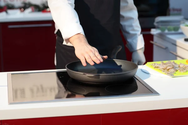 Chef and hot pan - Stock Image - Everypixel