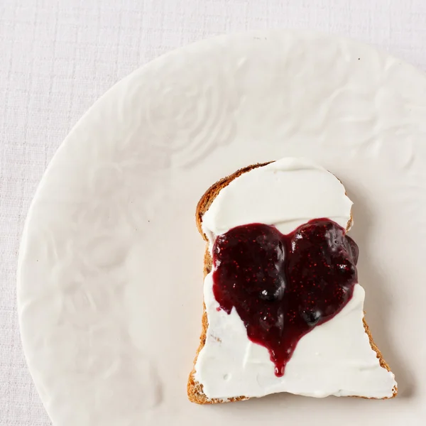Toast with heart jam Stock Photo by ©Shebeko 29816703
