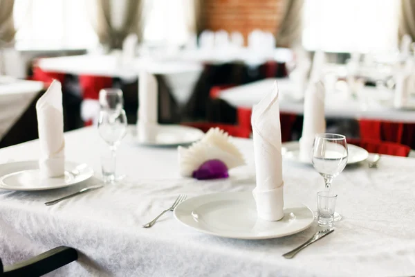Tables set for meal Stock Photo by ©Shebeko 24316763