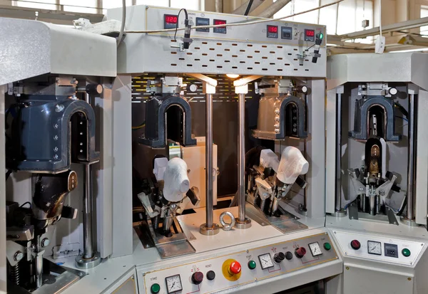 Machine for the production of shoes. industrial equipment - Stock Image ...