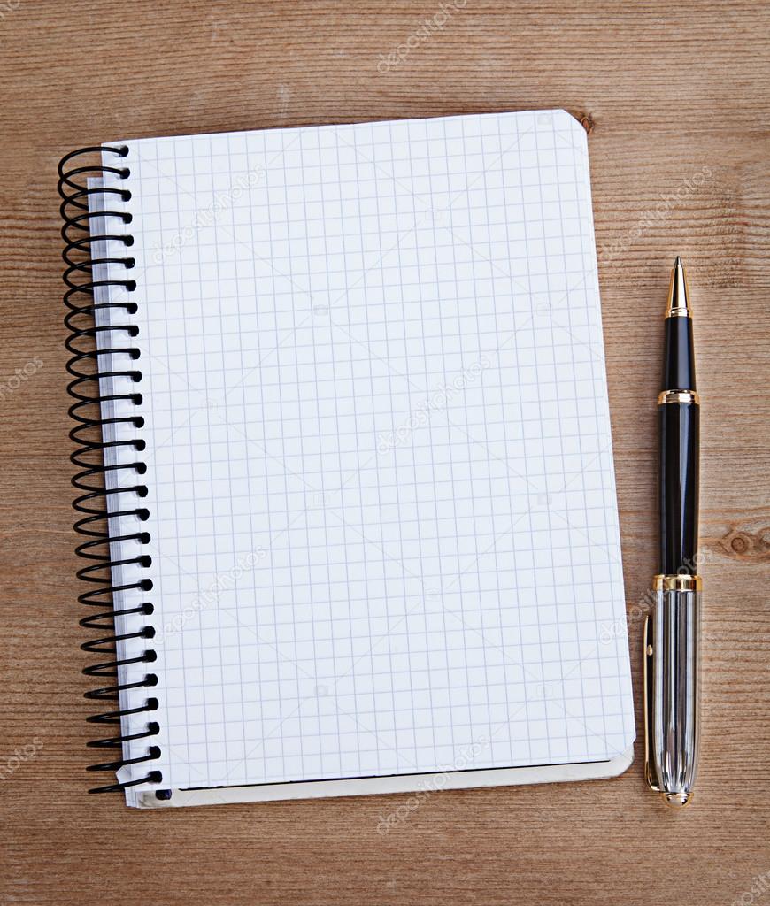 Open Notebook With Pen