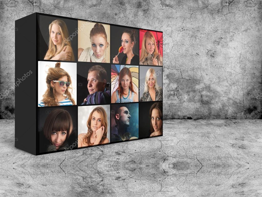 Digital wall with portraits — Stock Photo © spaxiax #26806577