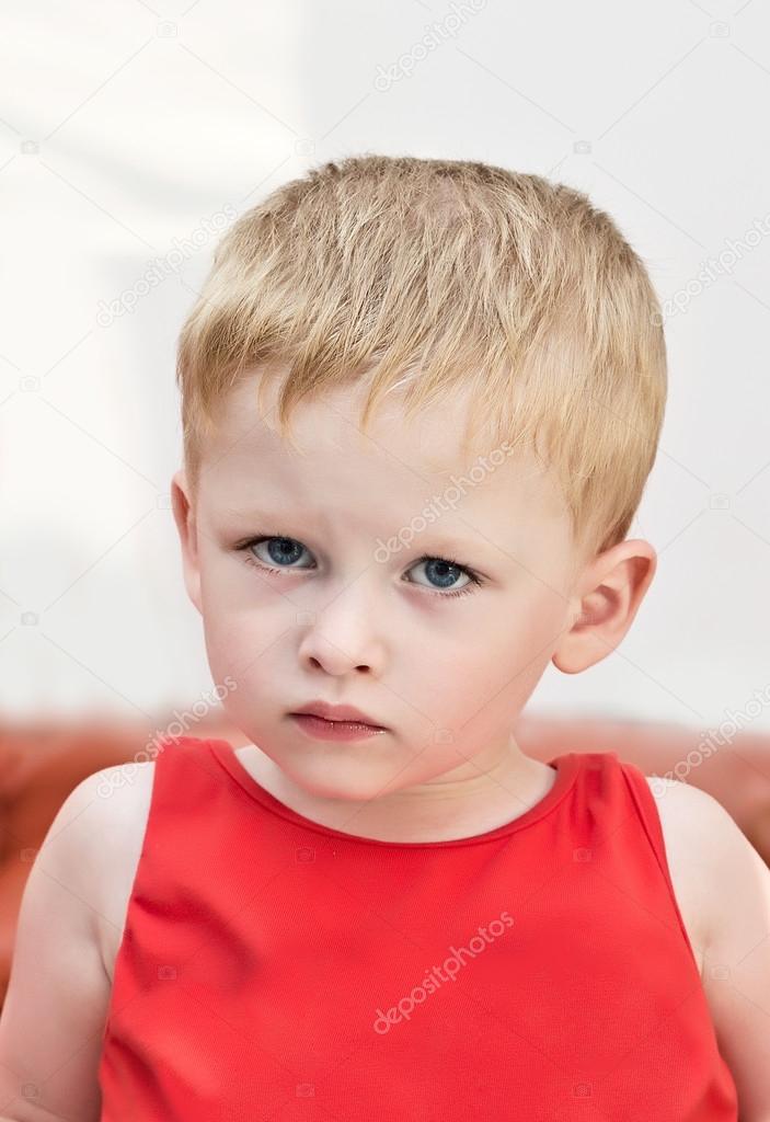 Portrait of kid serious — Stock Photo © irogova #35411905