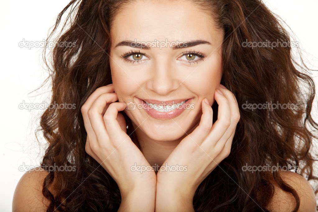 Beautiful curtly brunette young woman — Stock Photo © repinanatoly ...