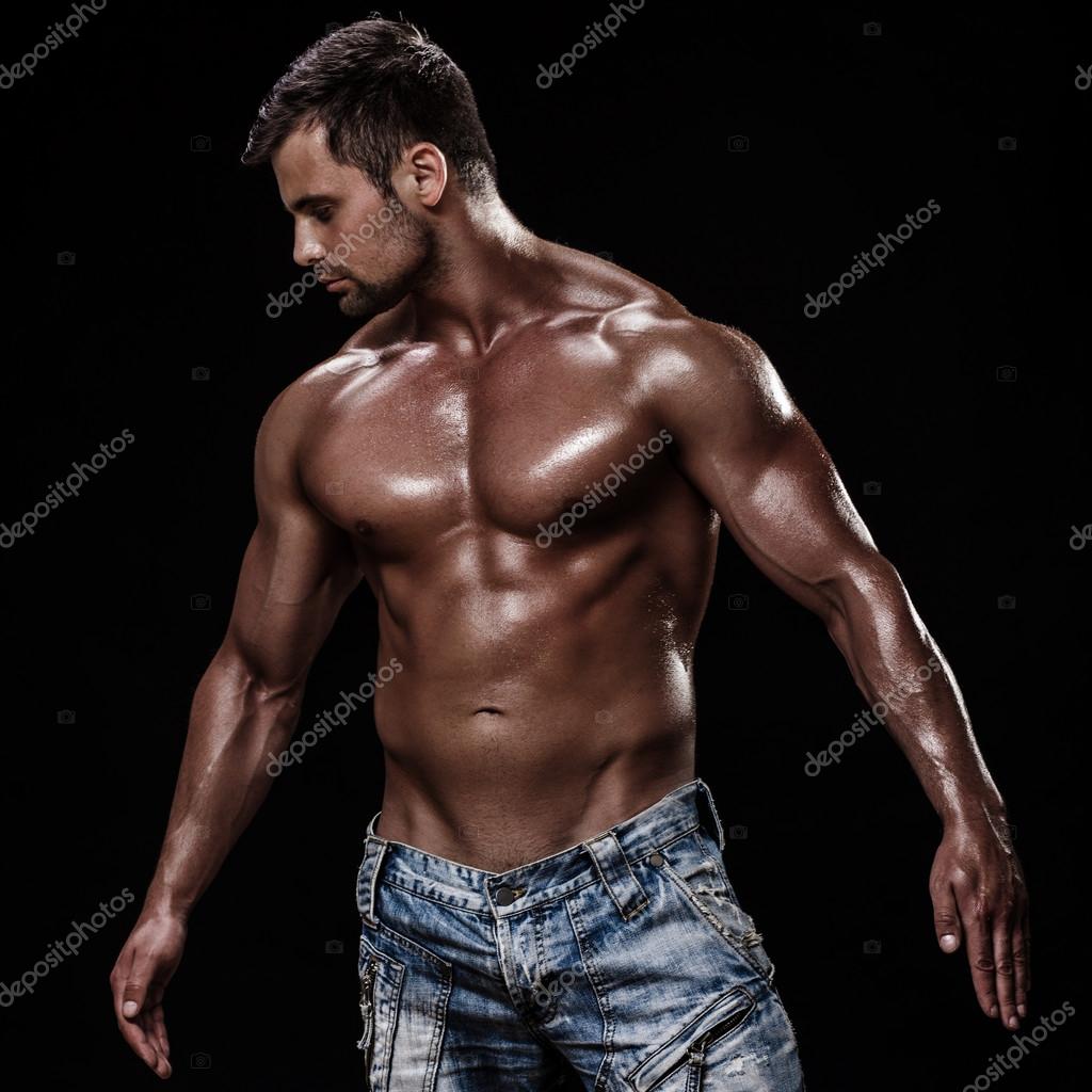 Athletic young man on black background Stock Photo by ©repinanatoly ...