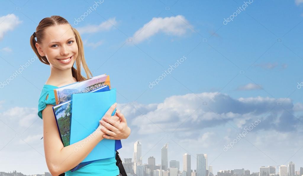 Happy student with books — Stock Photo © SergeyNivens #12673400