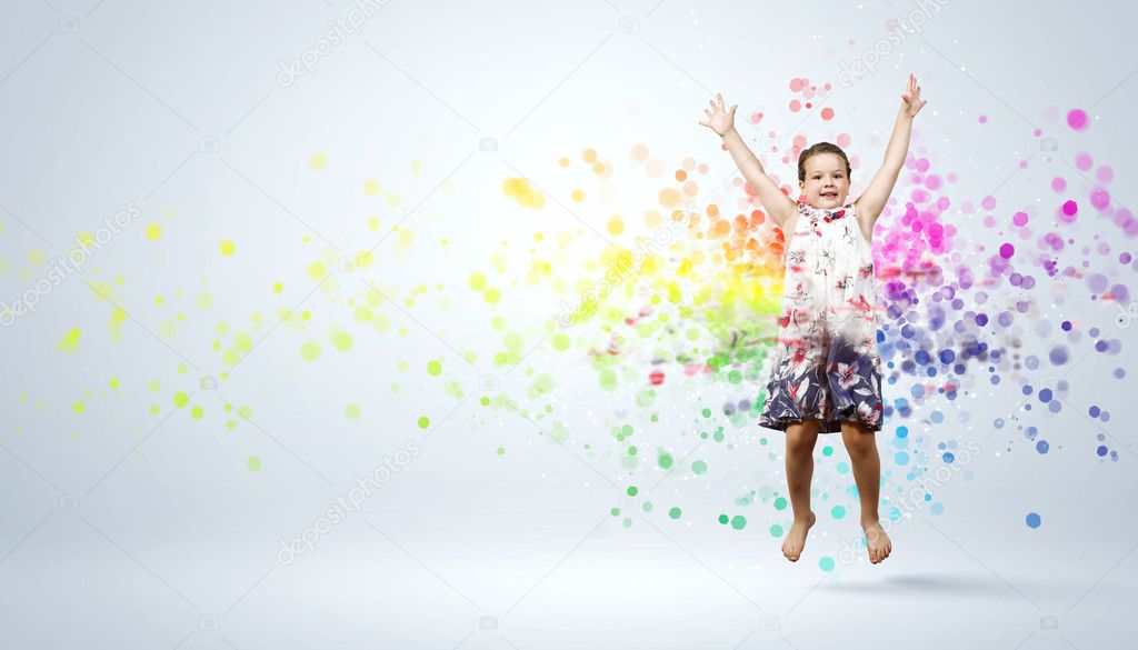 Happy kid jumping — Stock Photo © SergeyNivens #13635842