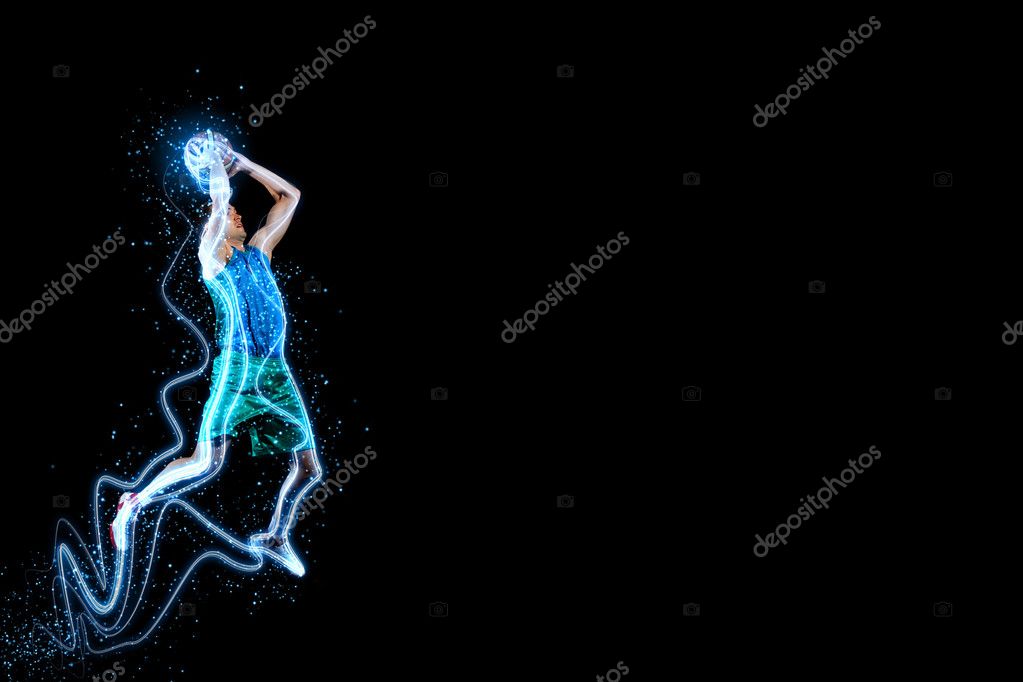 Basketball player with a ball — Stock Photo © SergeyNivens #14343519