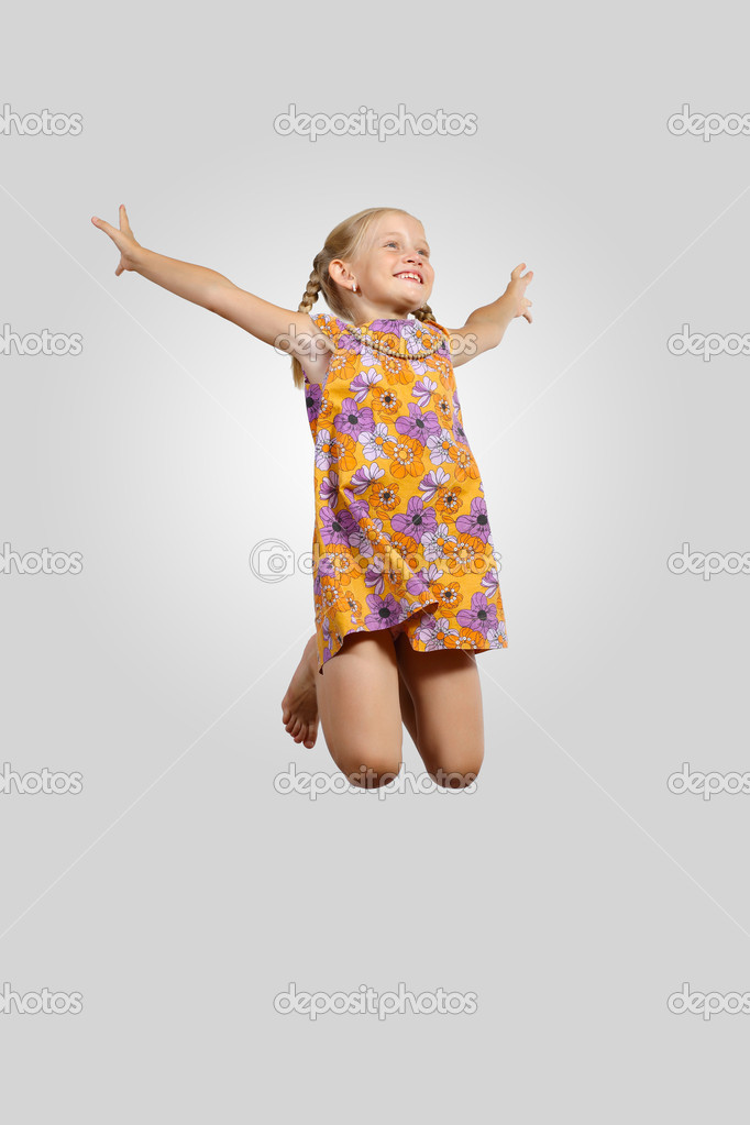 Happy kid jumping — Stock Photo © SergeyNivens #14563301