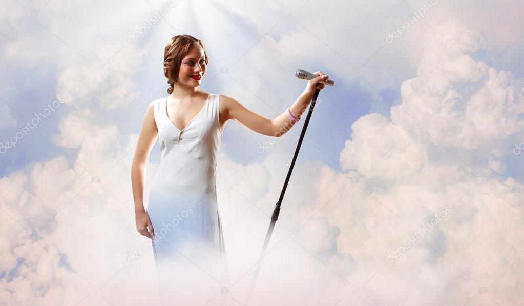 Portrait of female singer Stock Photo by ©SergeyNivens 16037609