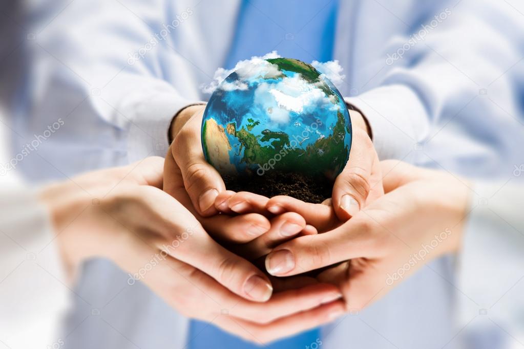 Earth planet in hands Stock Photo by ©SergeyNivens 29414311