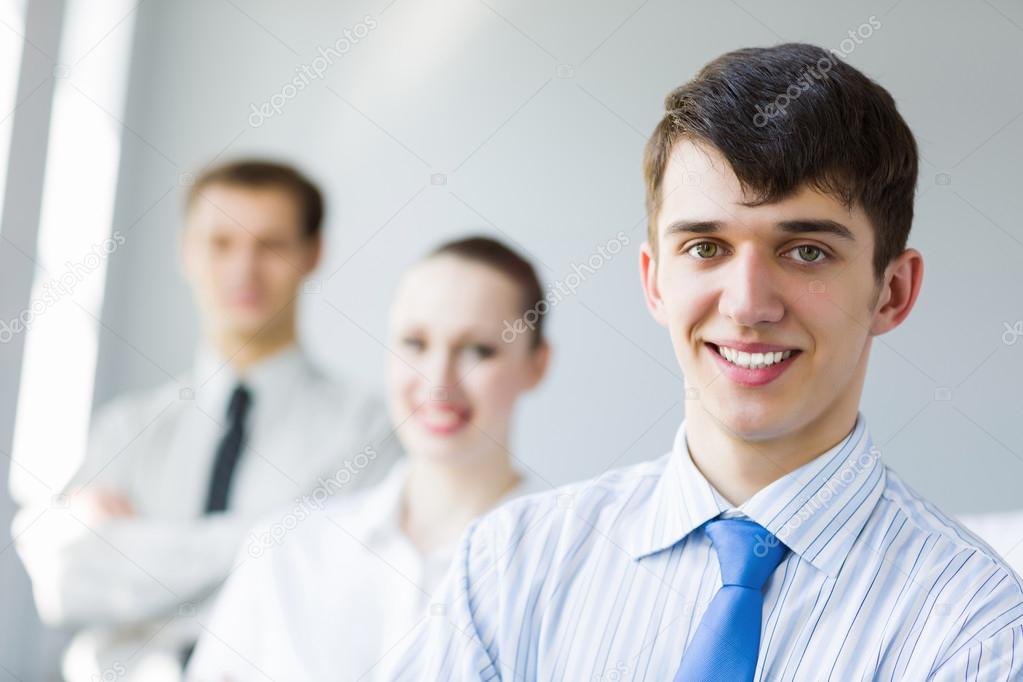 Young smiling businessman Stock Photo by ©SergeyNivens 29581821
