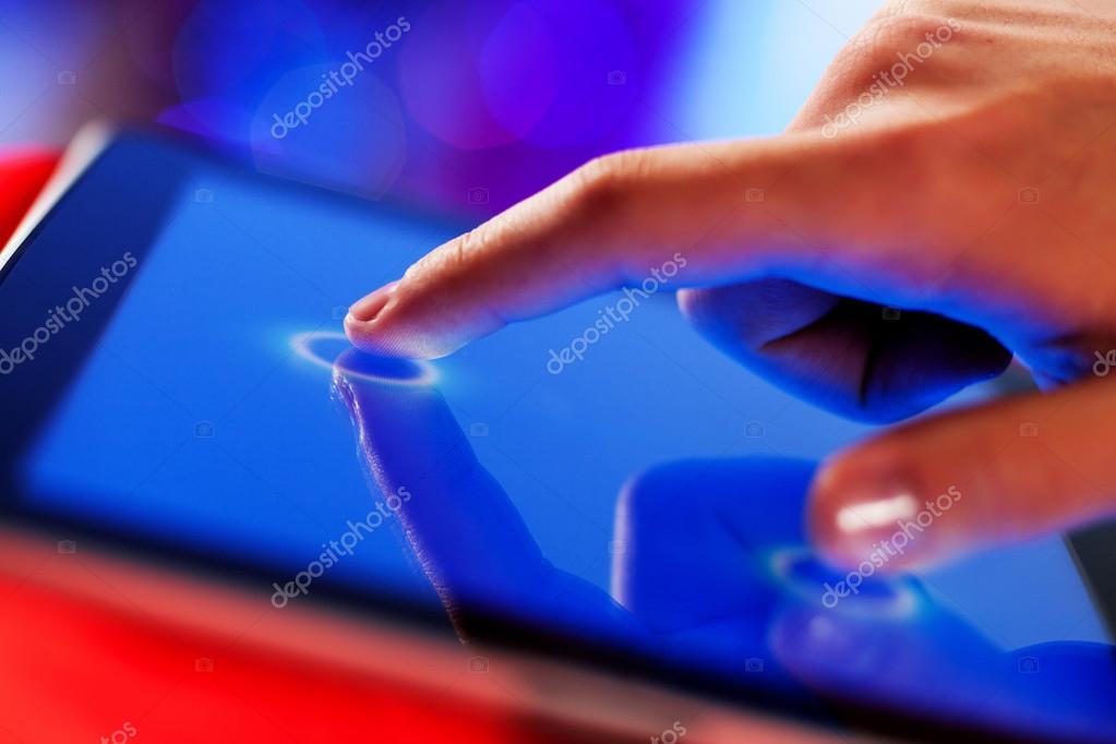 Finger touching screen Stock Photo by ©SergeyNivens 29977581